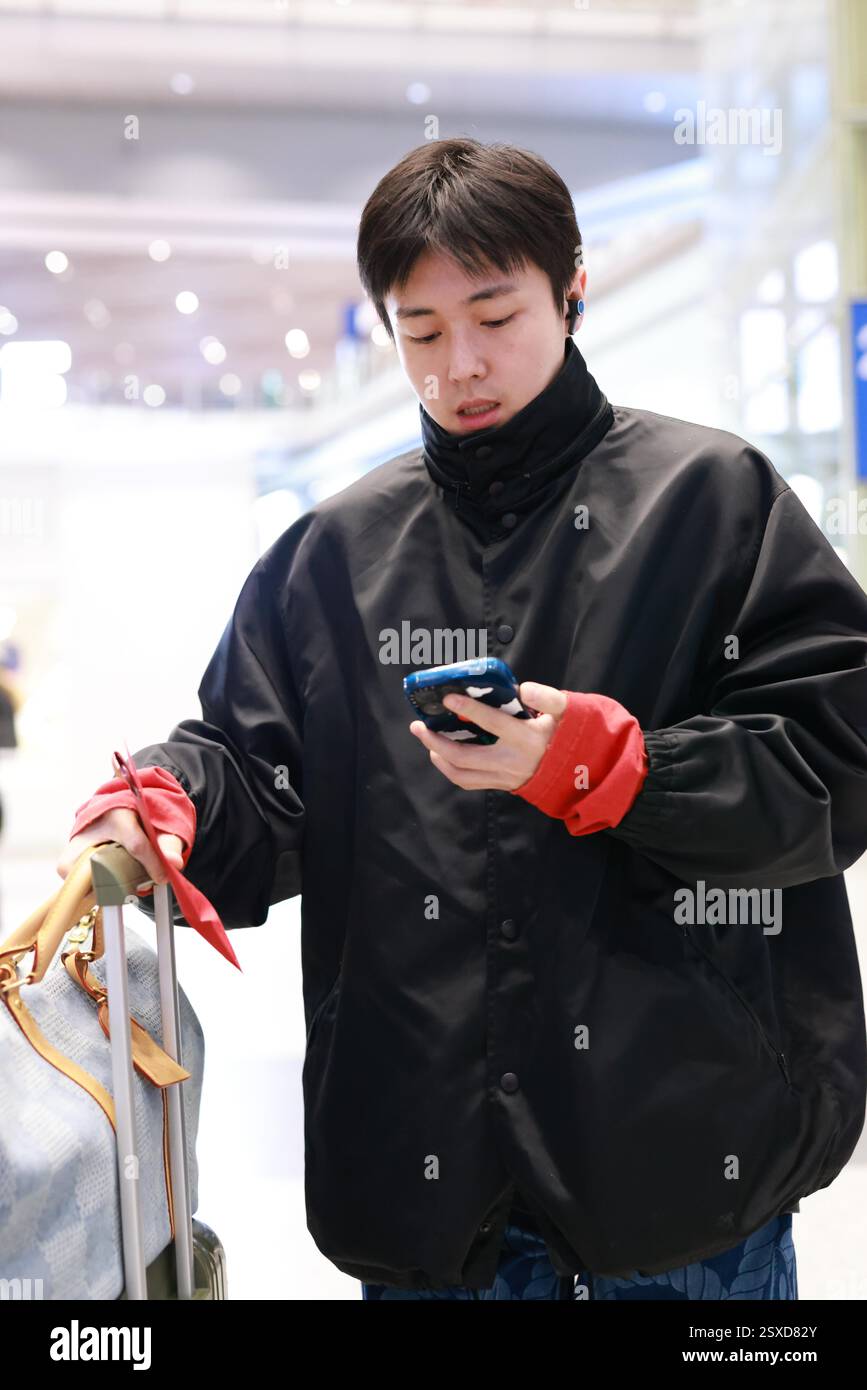 Chinese actor Zhai Zilu appears at the airport in Beijing, China, 21 ...