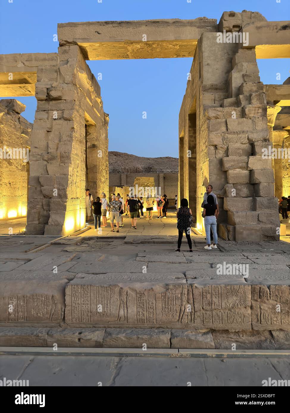 Aswan, Egypt - October 21, 2023: Tourists with the ruins during sunset ...