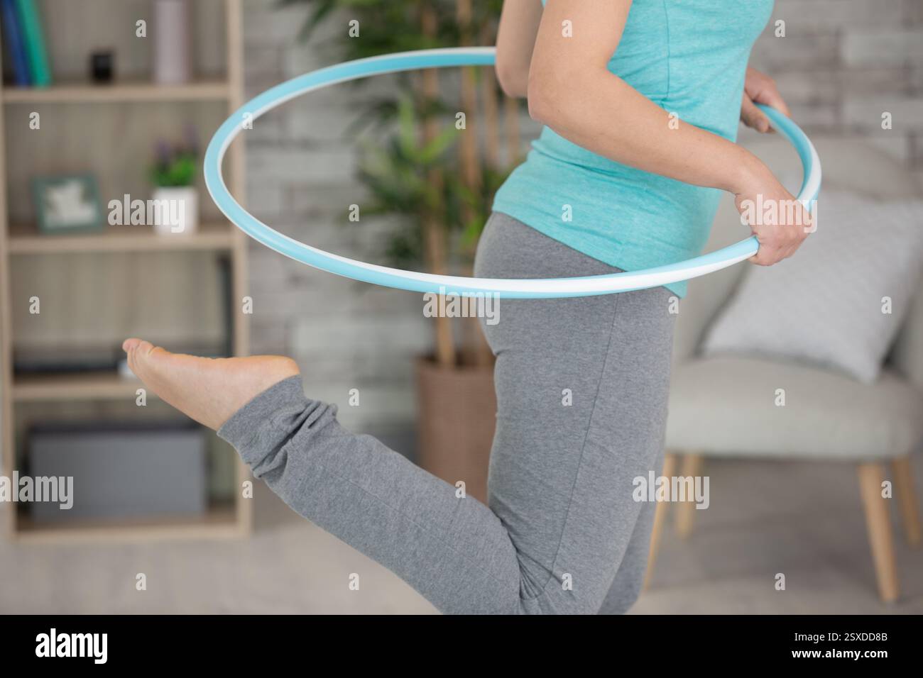 Woman doing hula hoop hi-res stock photography and images - Alamy