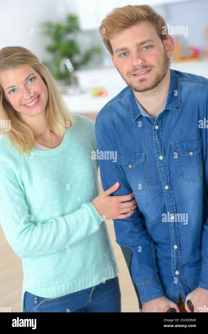 a woman is helping injured boyfriend Stock Photo - Alamy