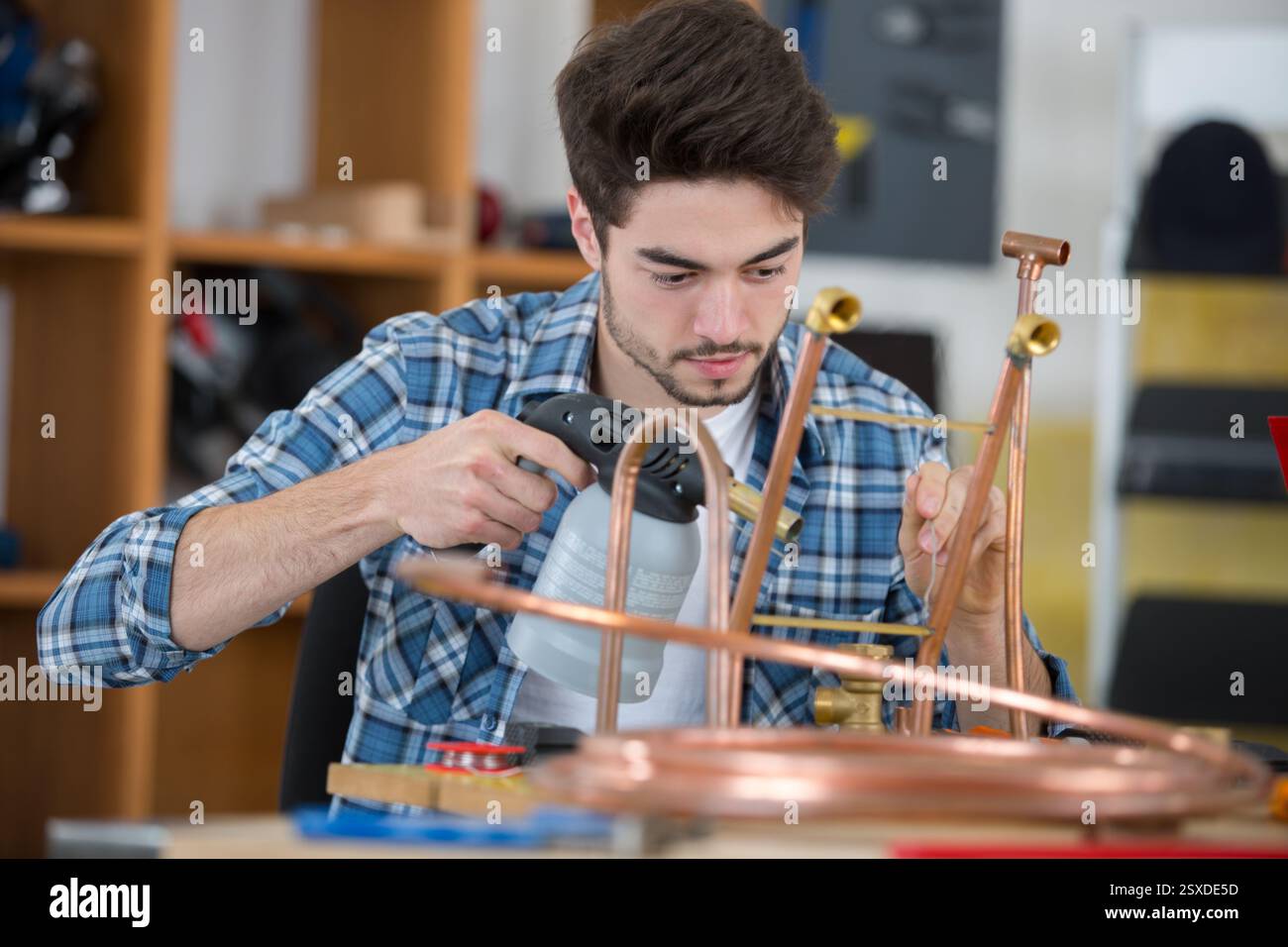 Man using blowtorch hi-res stock photography and images - Alamy