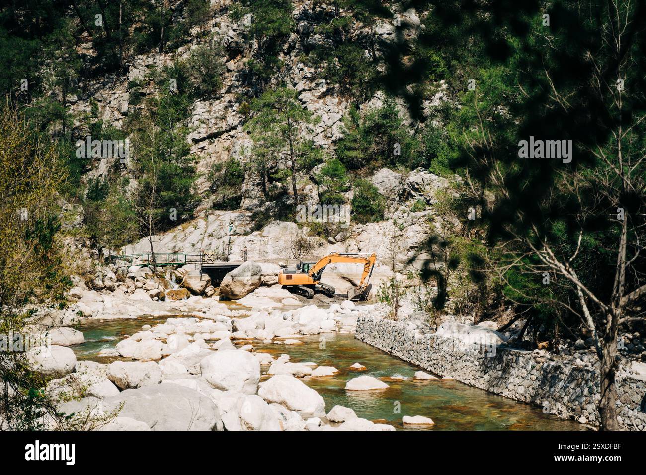 Heavy machinery dragline excavator digging ground in the mountain ...