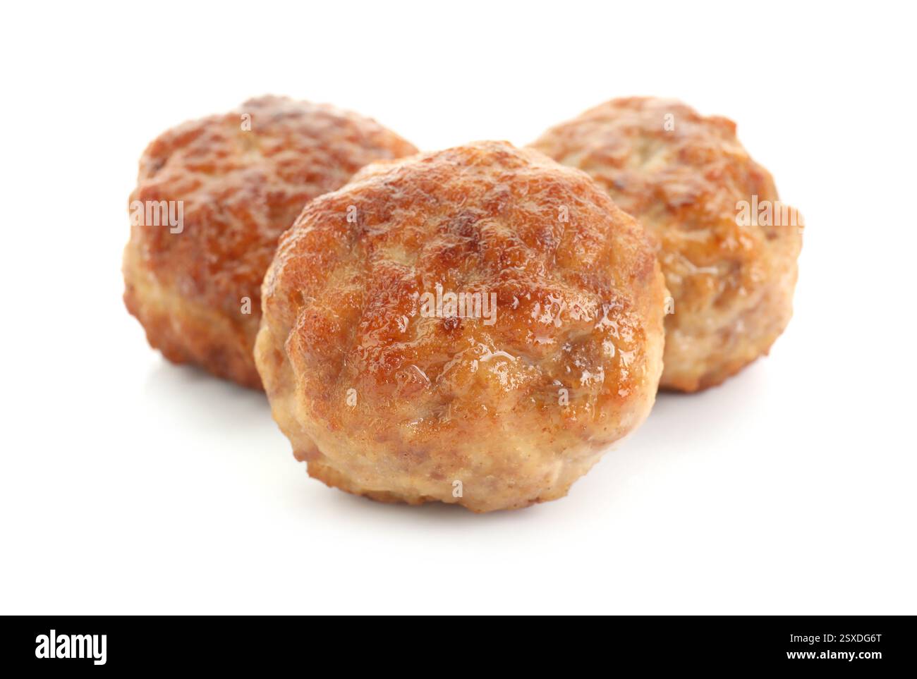 Three tasty cooked meatballs isolated on white Stock Photo - Alamy
