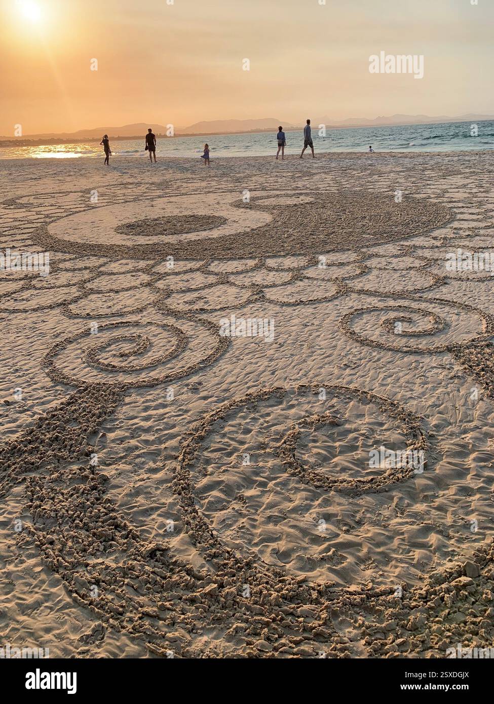 Beach mandala Byron Bay Stock Photo - Alamy