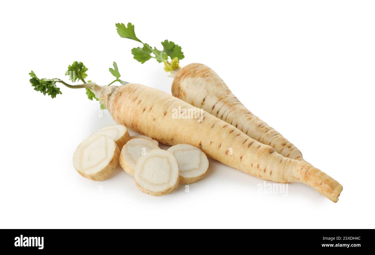 Whole and cut fresh parsley roots isolated on white Stock Photo - Alamy