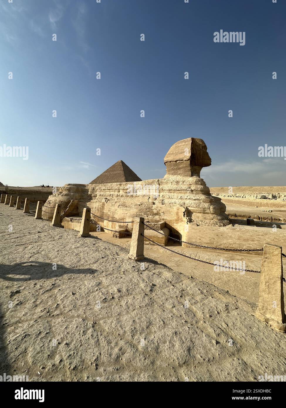 The Great Sphinx and Pyramid of Giza in a sunny day with shadow of a ...