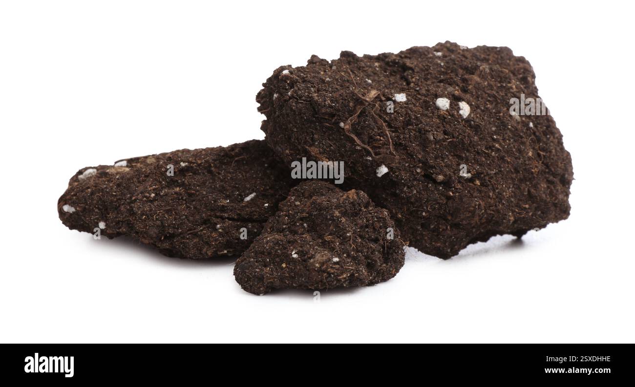 Piles of fresh soil isolated on white Stock Photo - Alamy
