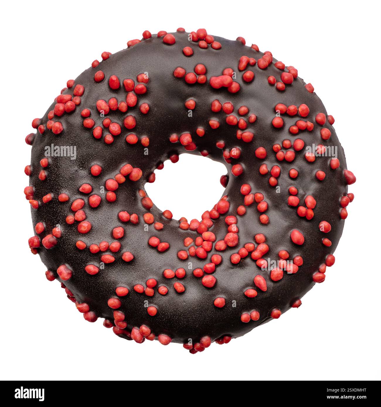 Single donut decorated with dark chocolate icing and red sprinkles ...