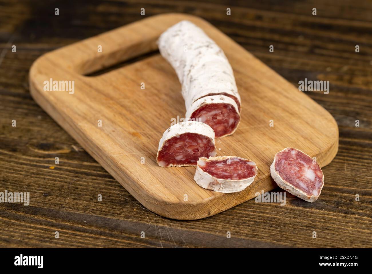 sausage in mold closeup, a delicacy made of pork and white mold to give ...