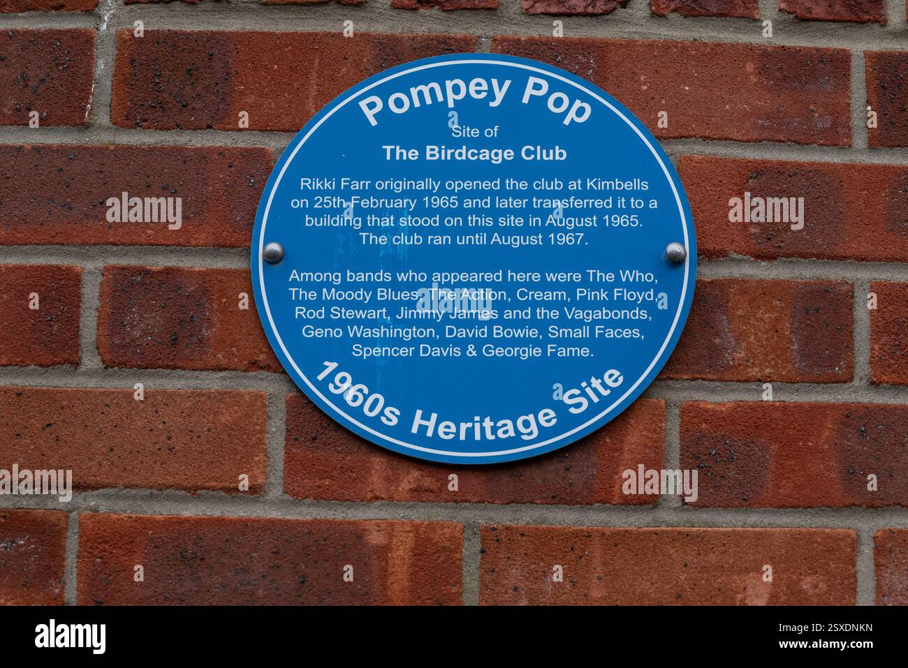 Memorial plaque on a wall to remember the site of the Birdcage Club in ...