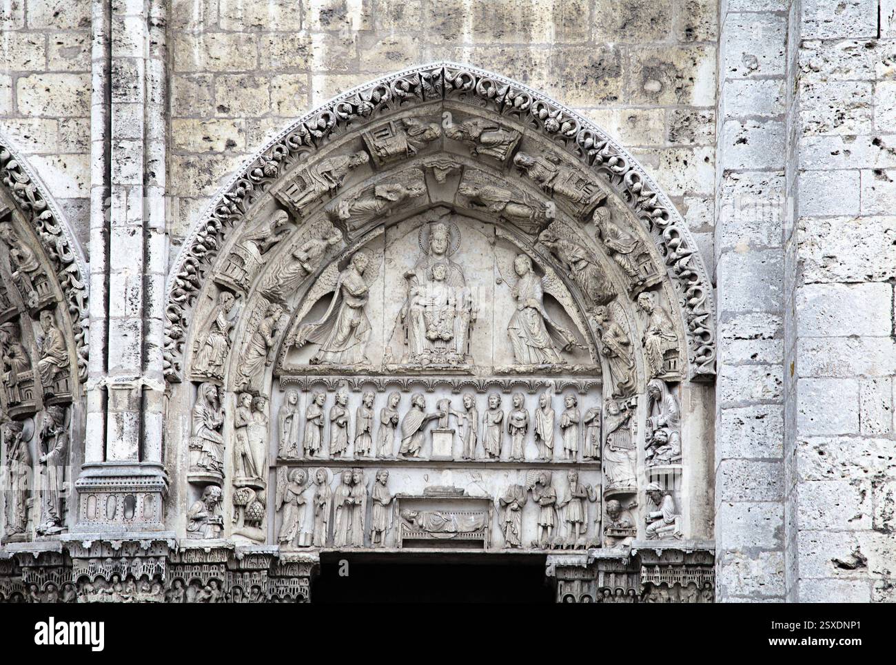Intricate stone carvings depict biblical scenes at Notre-Dame de ...