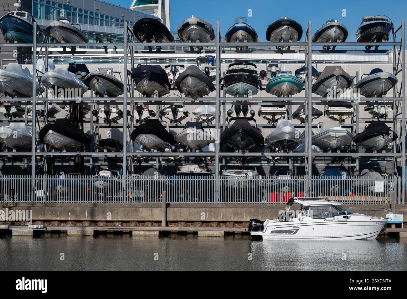 Racks of small boats stored in the winter months at the Camber dock in ...