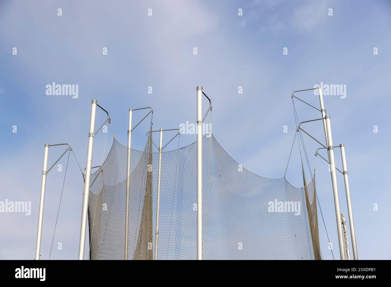 metal fencing with synthetic net to protect spectators at hammer ...