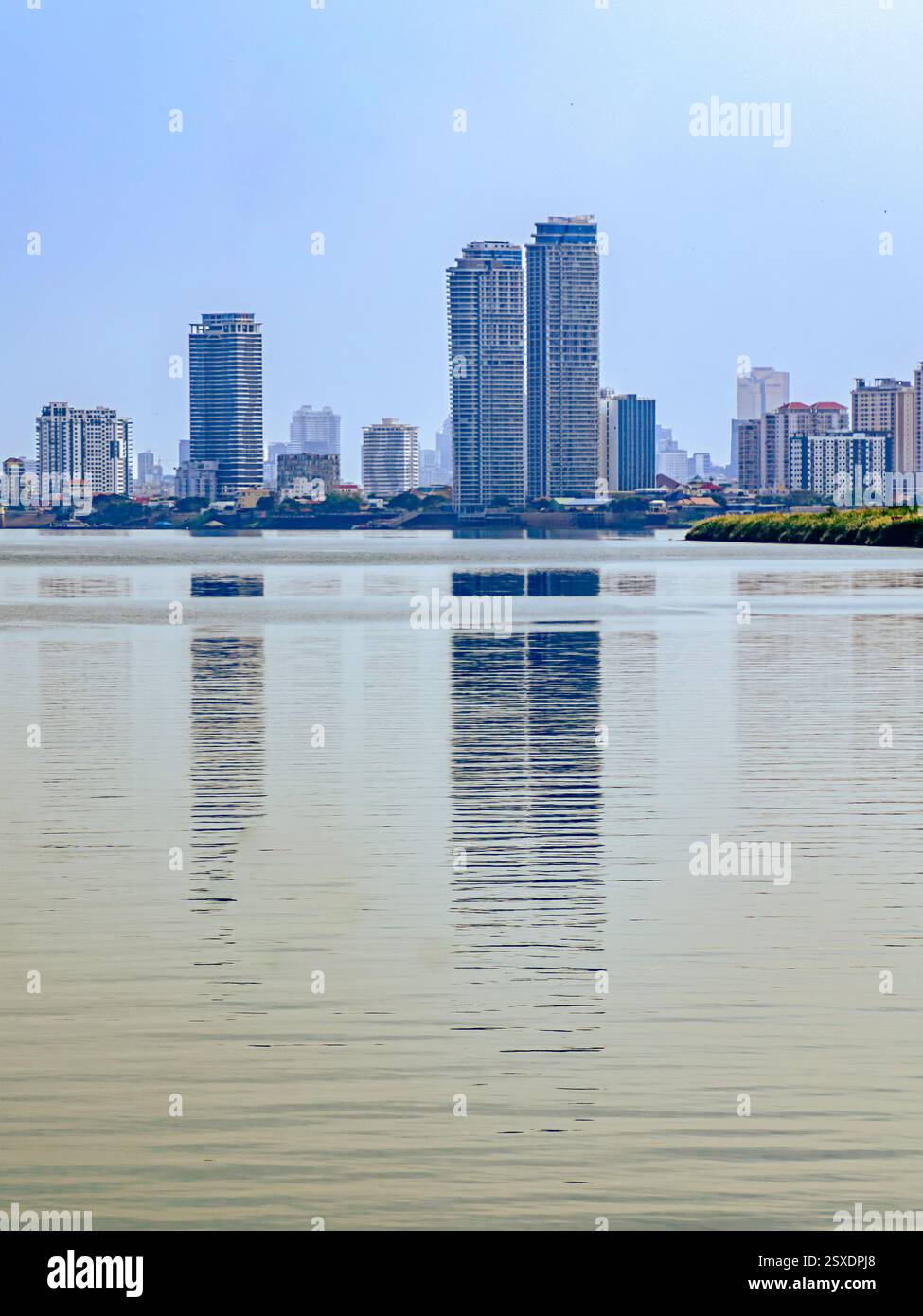 Phnom Penh skyline reflected in the Mekong River Stock Photo - Alamy