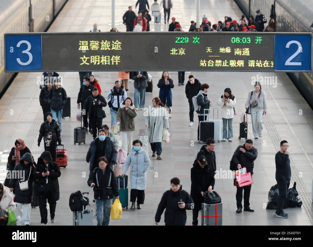 Passengers are seen at Yangzhou railway station in Yangzhou City, east ...