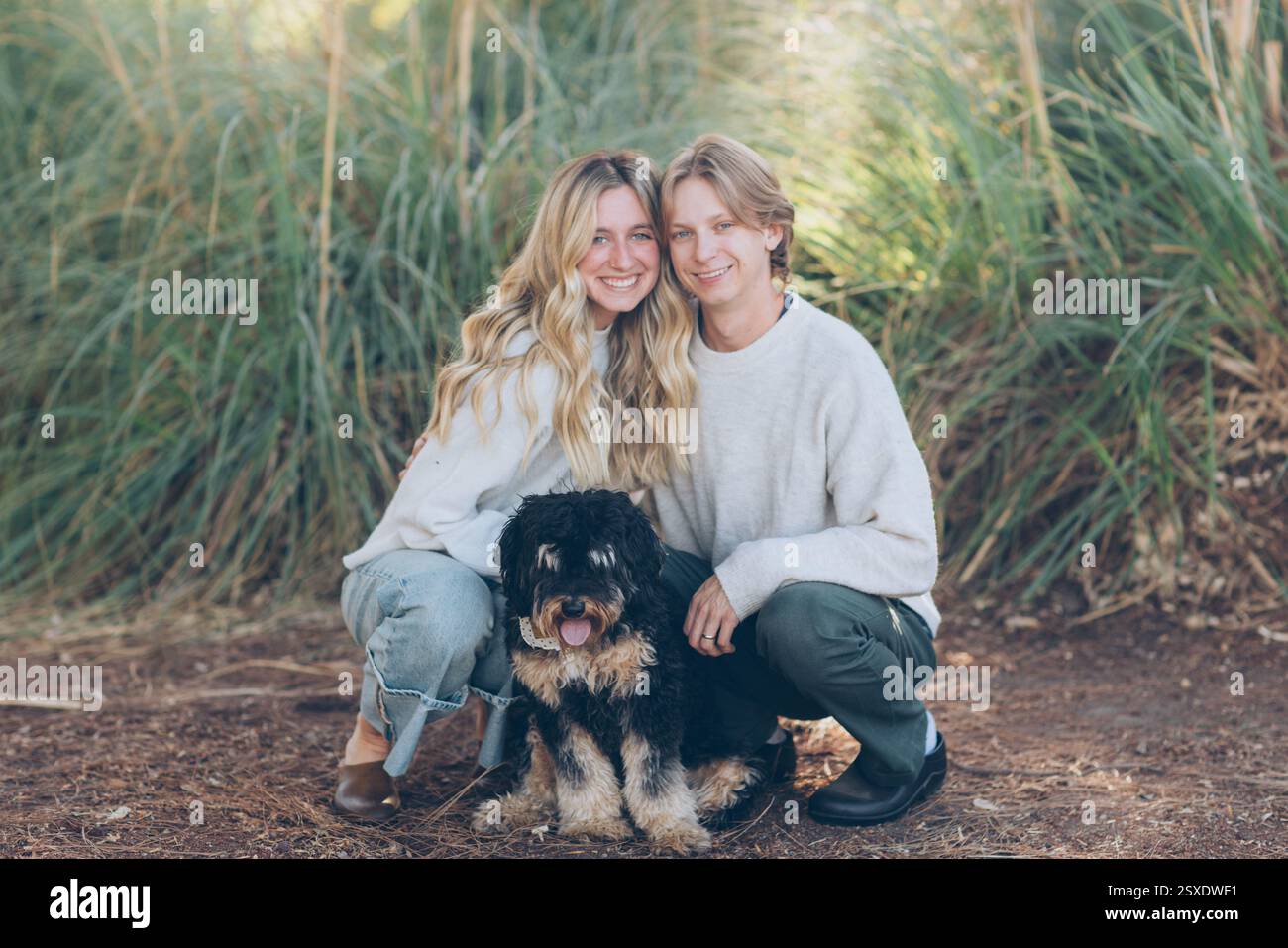 Adorable young people smiling posing hi-res stock photography and ...