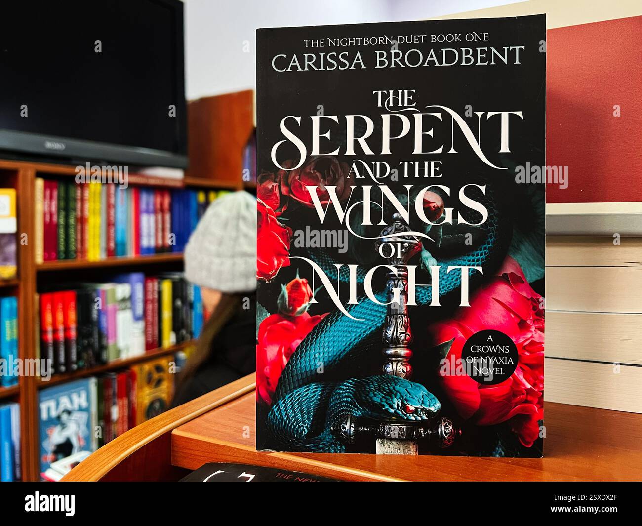 Lviv, Ukraine - February 20, 2025: Prominent cover of 'The Serpent and the Wings of Night' by ...
