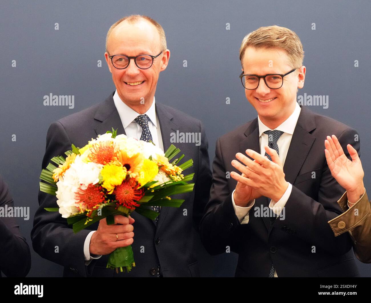 24 February 2025, Berlin: Friedrich Merz (l), CDU Federal Chairman and ...