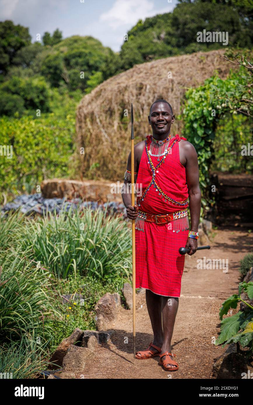 A Masai man wearing traditional Masai tribal attire in Kenya Stock ...
