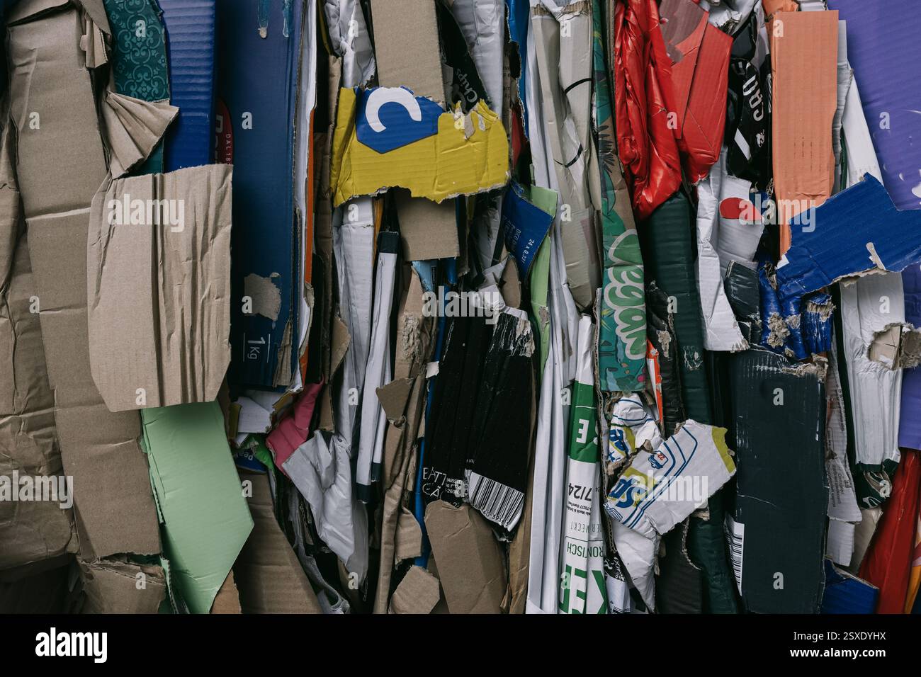 Compressed cardboard boxes on the street Stock Photo - Alamy