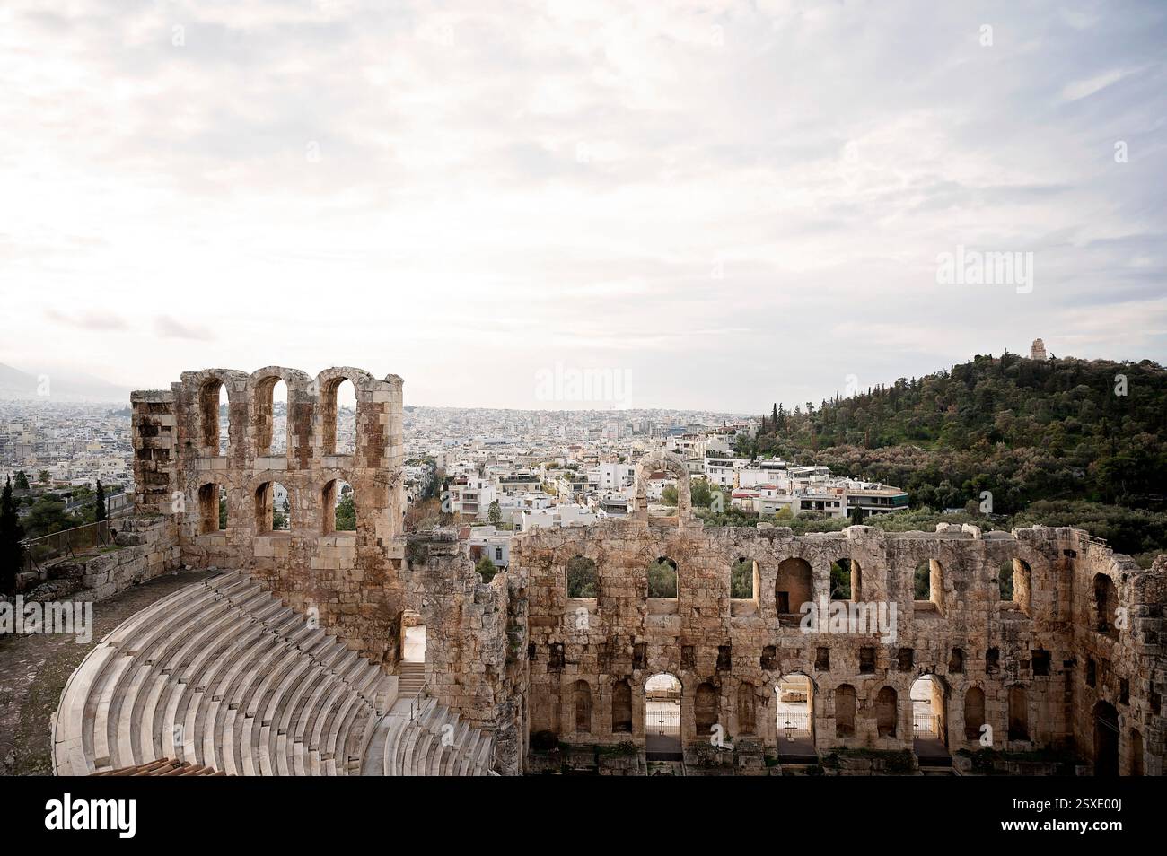 Ancient Odeon of Herodes Atticus overlooking Athens cityscape Stock ...