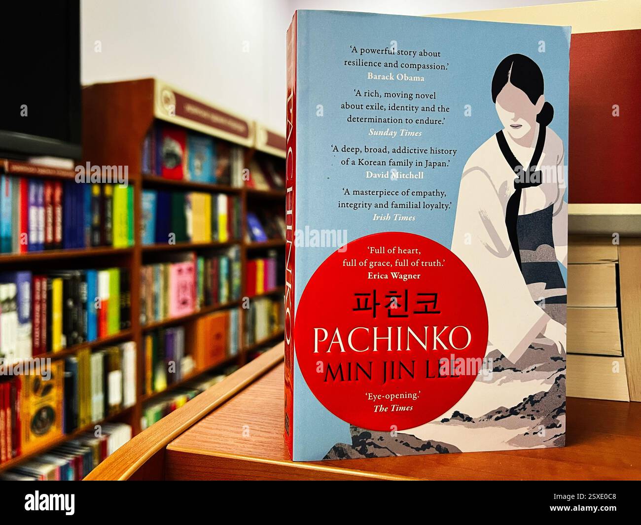 Lviv, Ukraine - February 20, 2025: Bookstore display featuring Pachinko by Min Jin Lee amidst ...