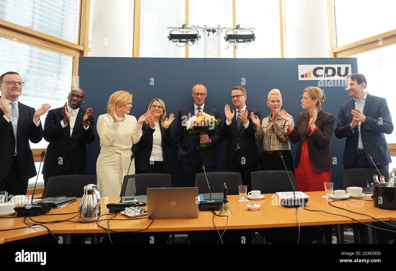 24 February 2025, Berlin: Friedrich Merz (center l), CDU Federal ...