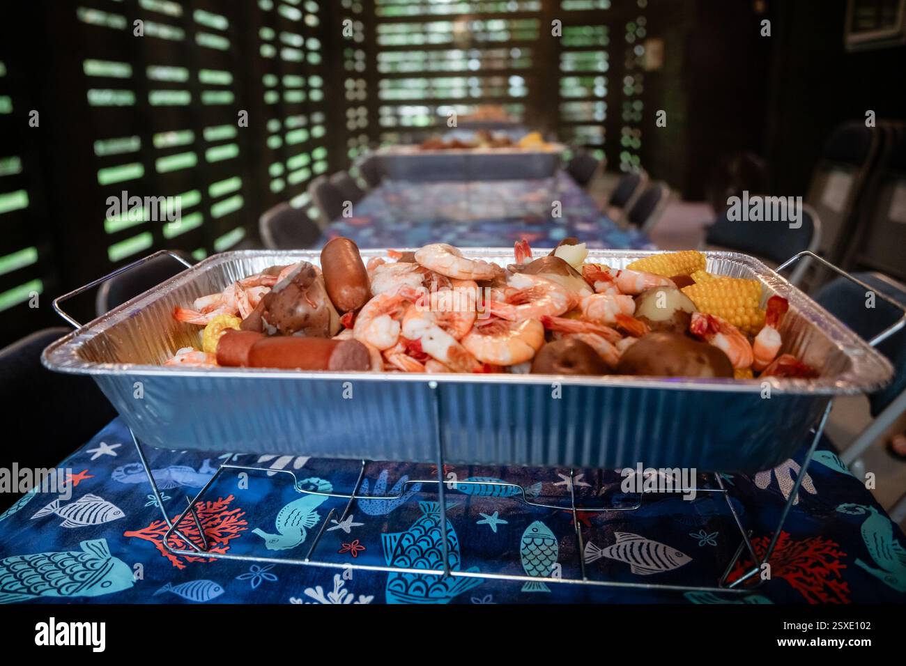 Shrimp boil feast on beach house patio during summertime Stock Photo ...