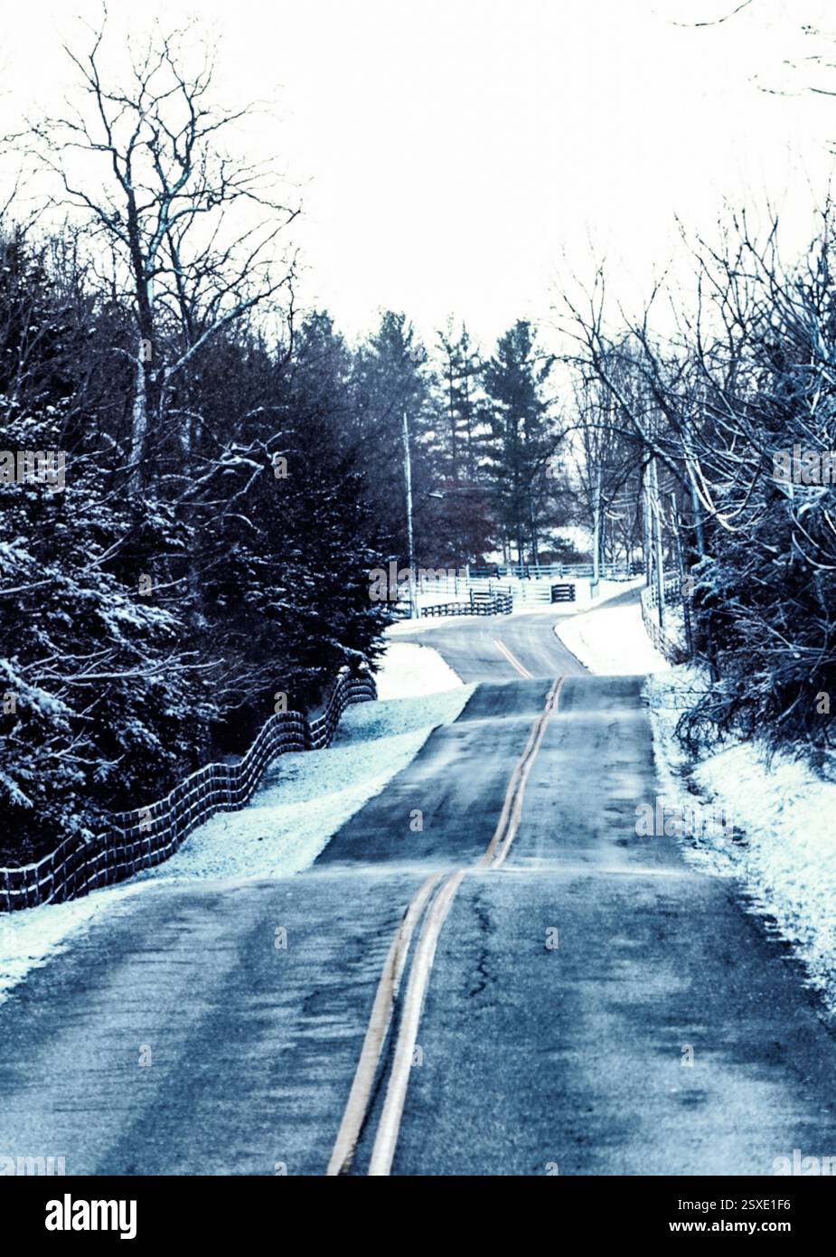 A snowy country back road Stock Photo - Alamy