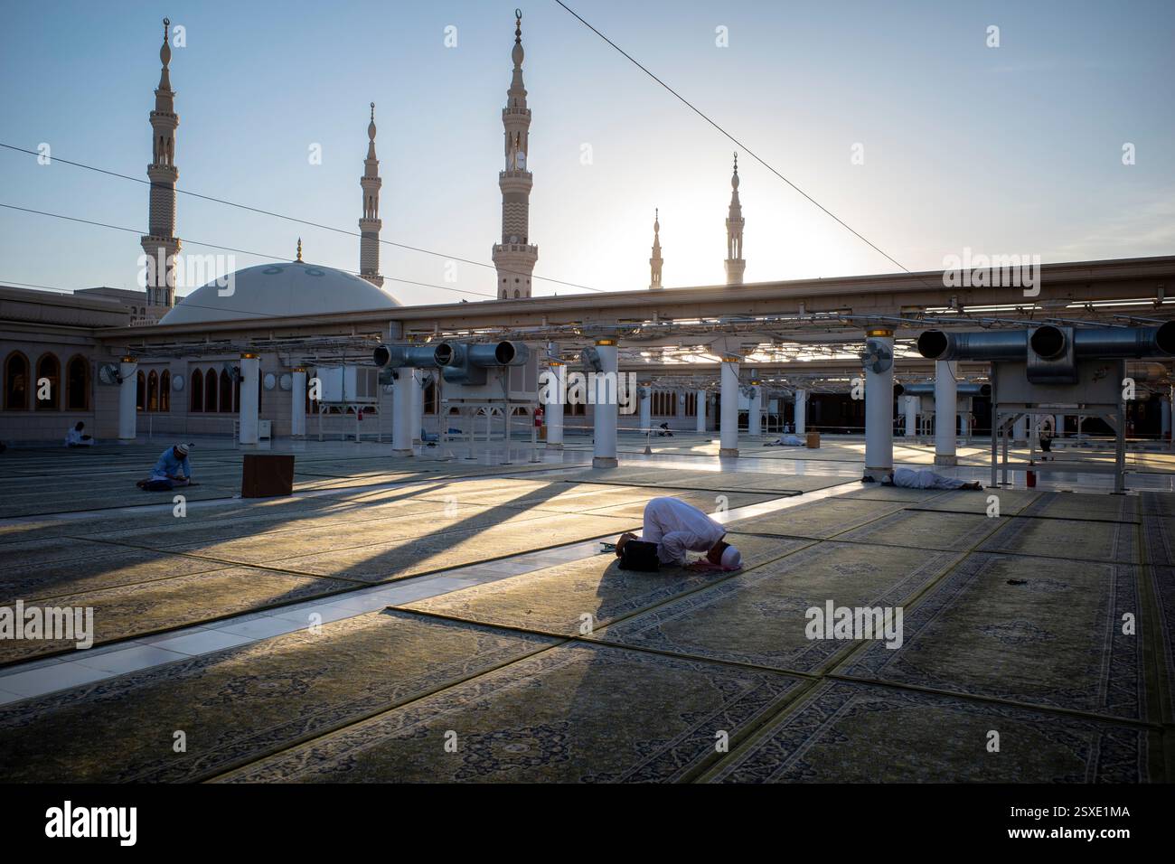 Medina, Saudi Arabia - July 3, 2024: A hajj pilgrim praying on the roof ...