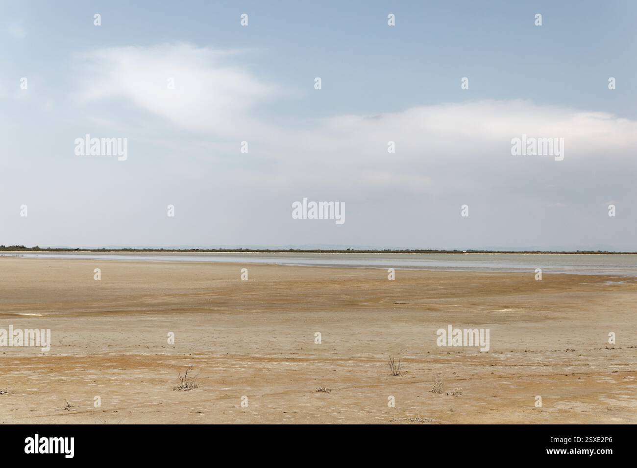 Empty basin in the Camargue revealing colourful sand beach (France ...