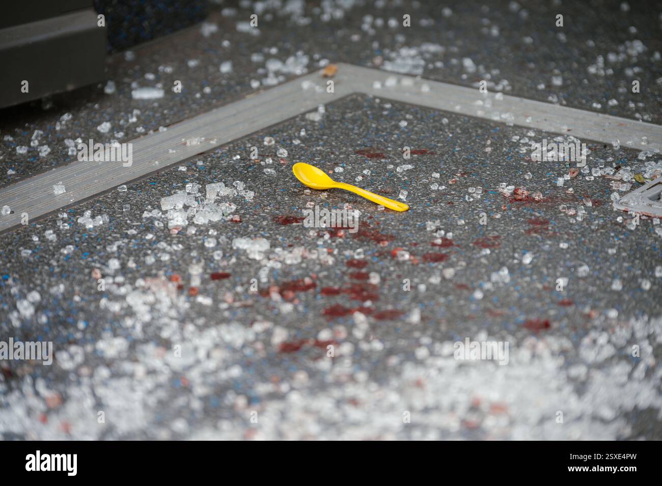 24 February 2025, Saarland, Saarbrücken: Blood and a plastic spoon can ...