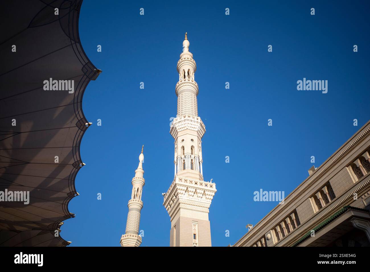 The giant automatic Umbrellas and minarets in Prophet Mosque in Madinah ...