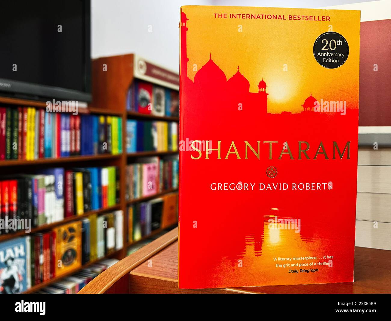 Lviv, Ukraine - February 20, 2025: A book cover of Shantaram by Gregory ...