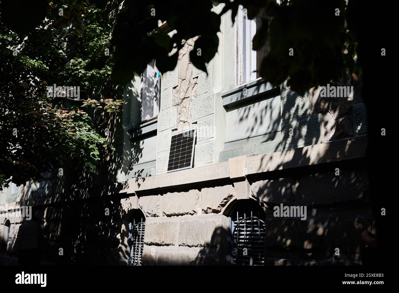 Photovoltaic Solar Panel In Front Of Historical Building Concept Of