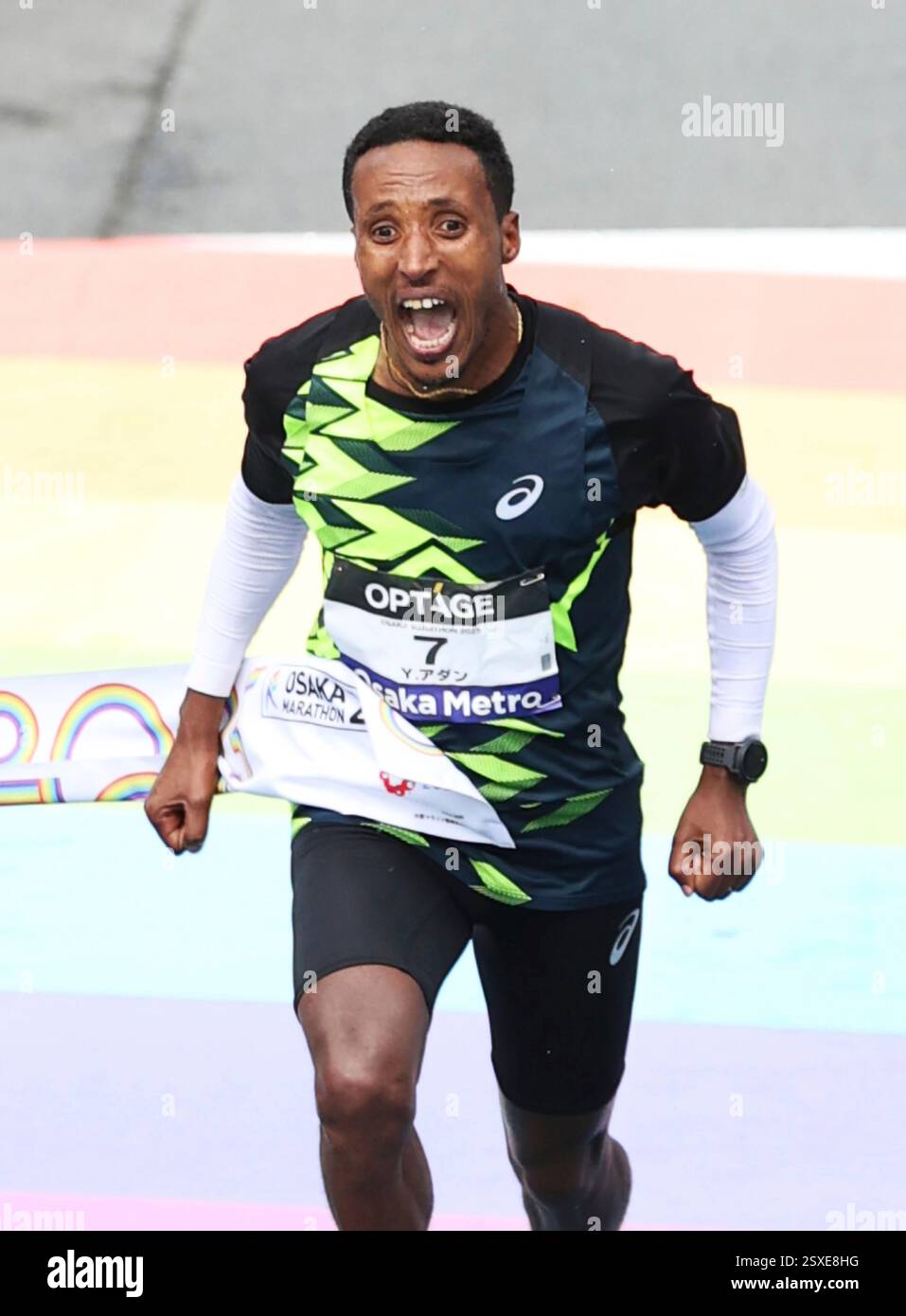 ADANE Yihunilign of Ethiopia cresses the finish line during the Osaka ...