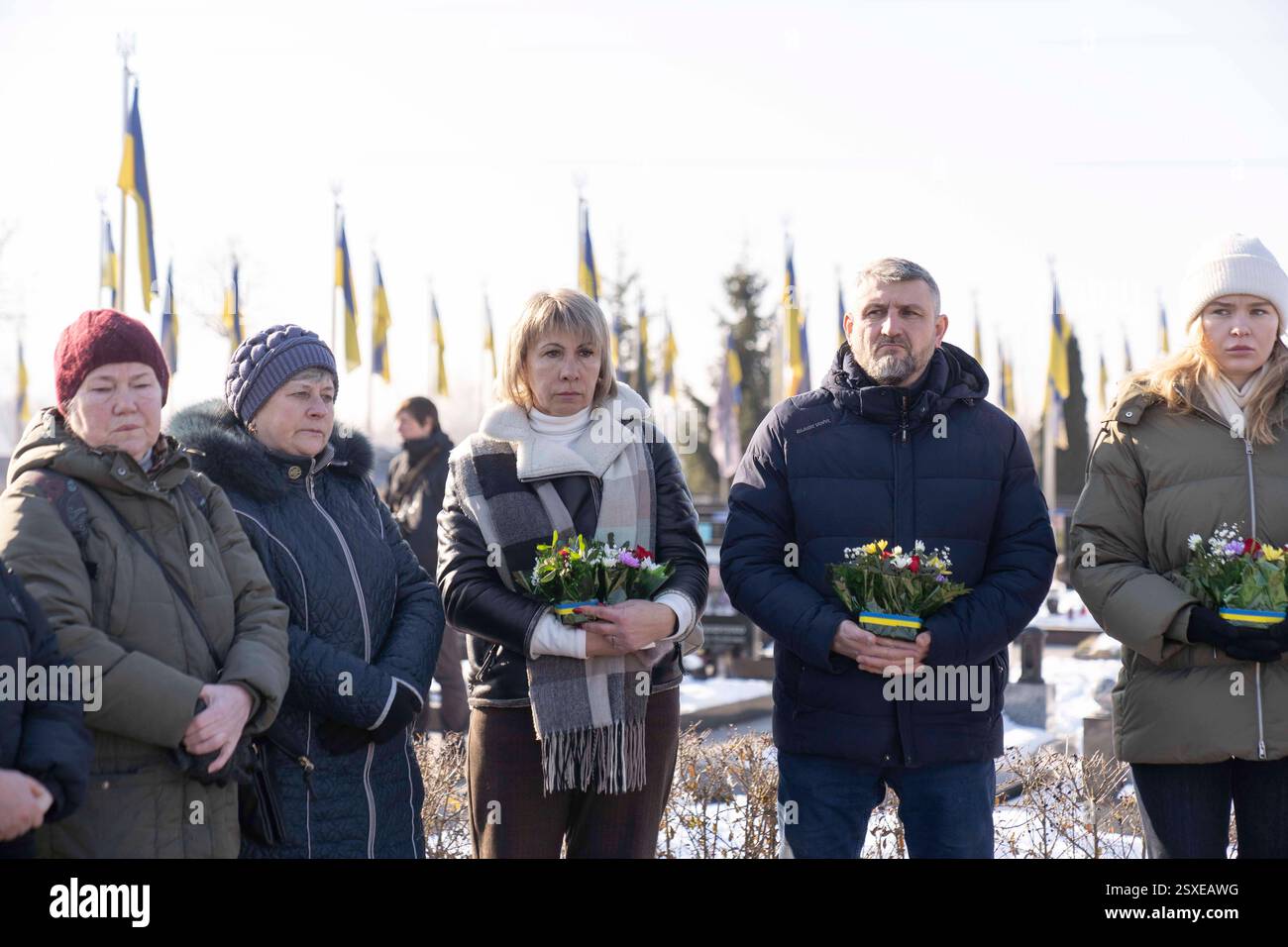 People gather for a ceremony on the 3rd year anniversary of Russia ...