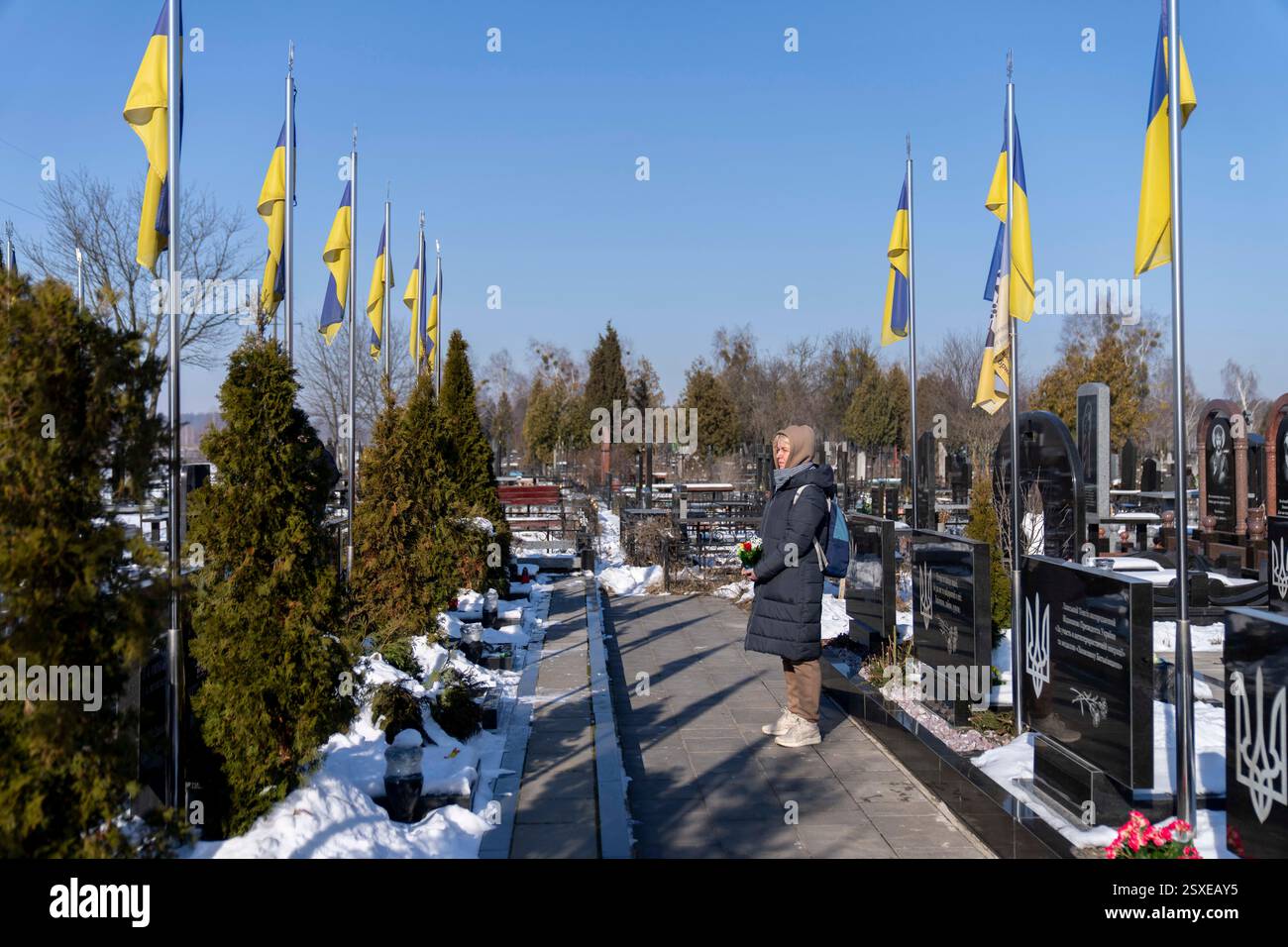 February 24, 2025, Bucha, Kyiv Region, Ukraine: People visiting the ...