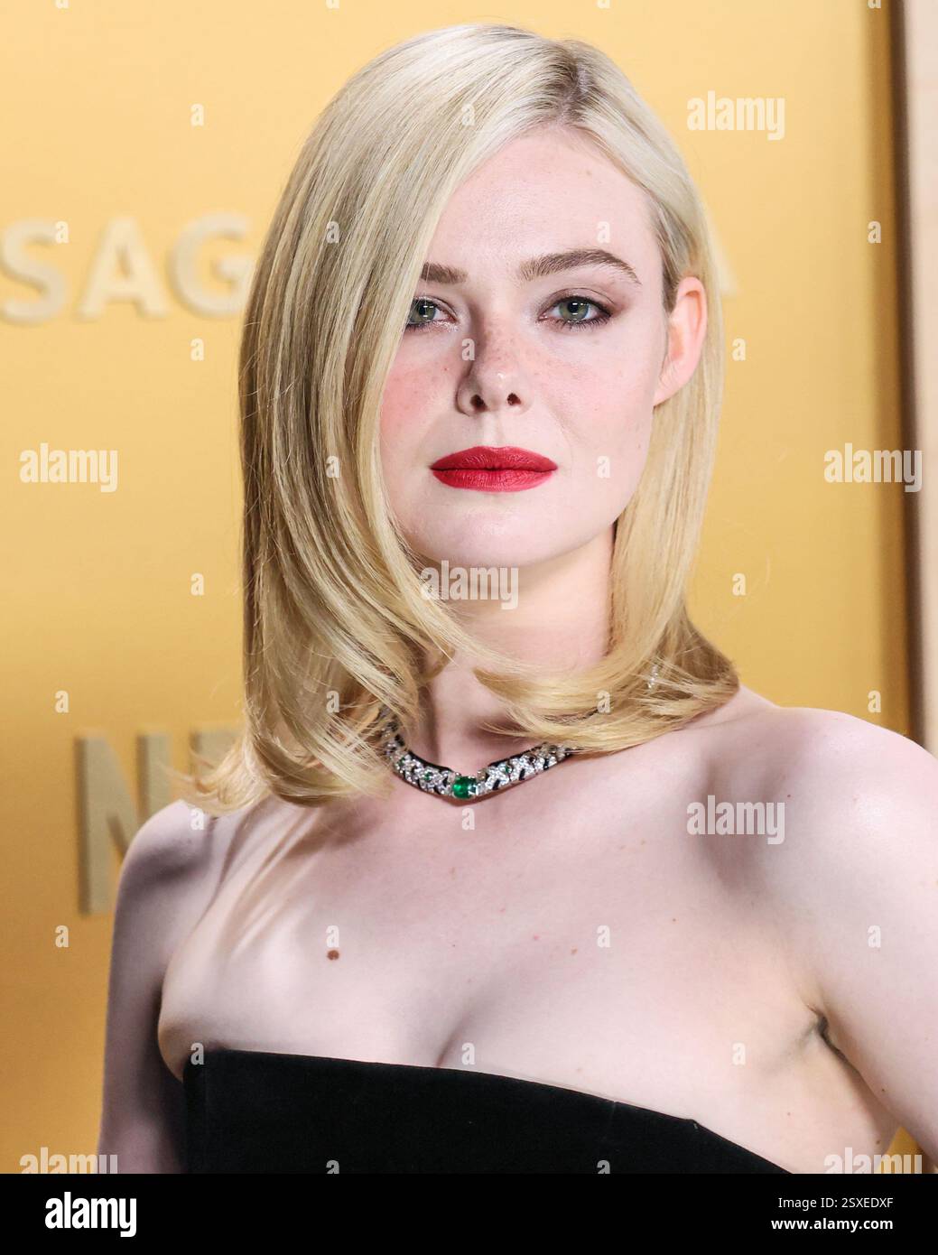 LOS ANGELES, CALIFORNIA, USA - FEBRUARY 23: Elle Fanning wearing a Loewe dress arrives at the ...