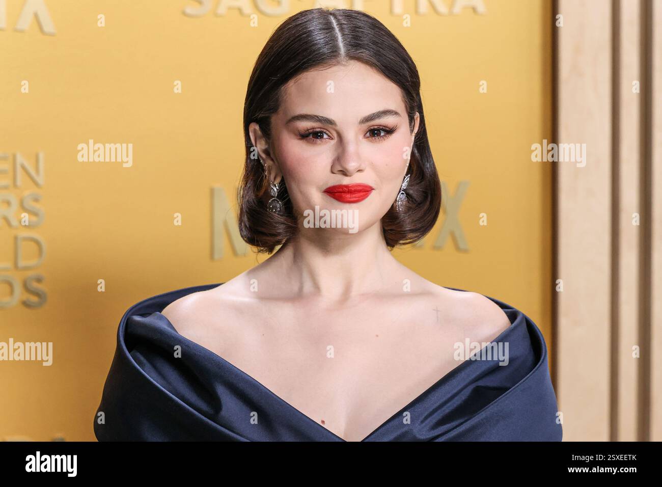 LOS ANGELES, CALIFORNIA, USA - FEBRUARY 23: Selena Gomez wearing a custom Celine dress, Jimmy ...