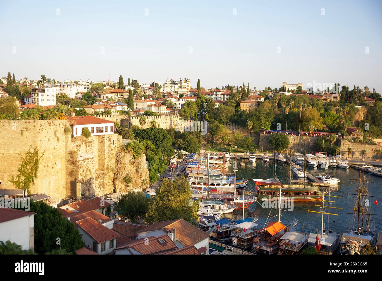 Turkey, Antalya. September 29, 2024: Historic coastal town with boats ...