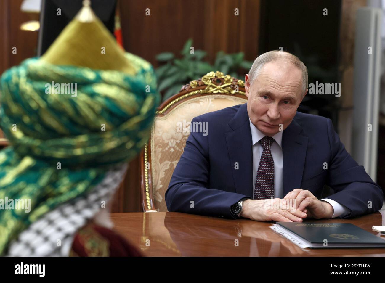 Russian President Vladimir Putin attends a meeting with the Supreme ...