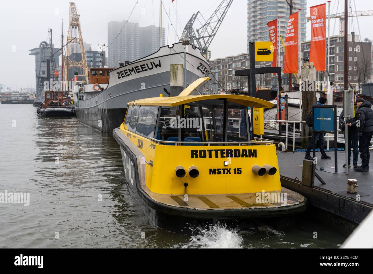 Rotterdam, Netherlands - December 5, 2023: A yellow water cab with the ...