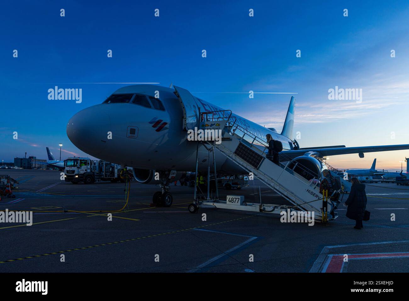 COLOGNE, GERMANY - FEBRUARY 23, 2025: Eurowings passenger airplane at ...