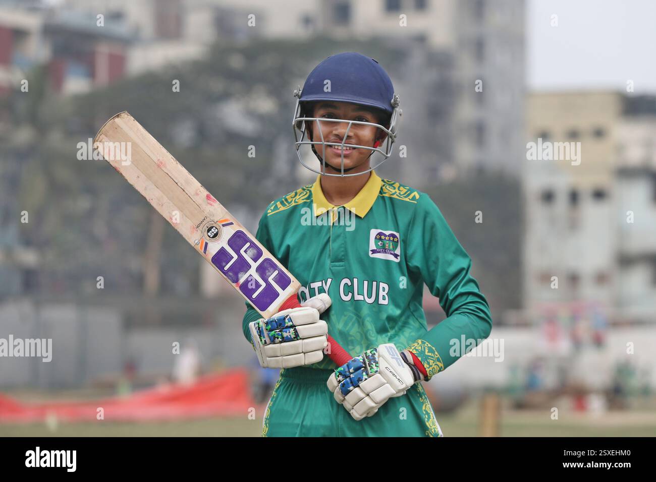 Dhaka, Bangladesh. 18th Feb, 2025. A cricket teenager poses for ...