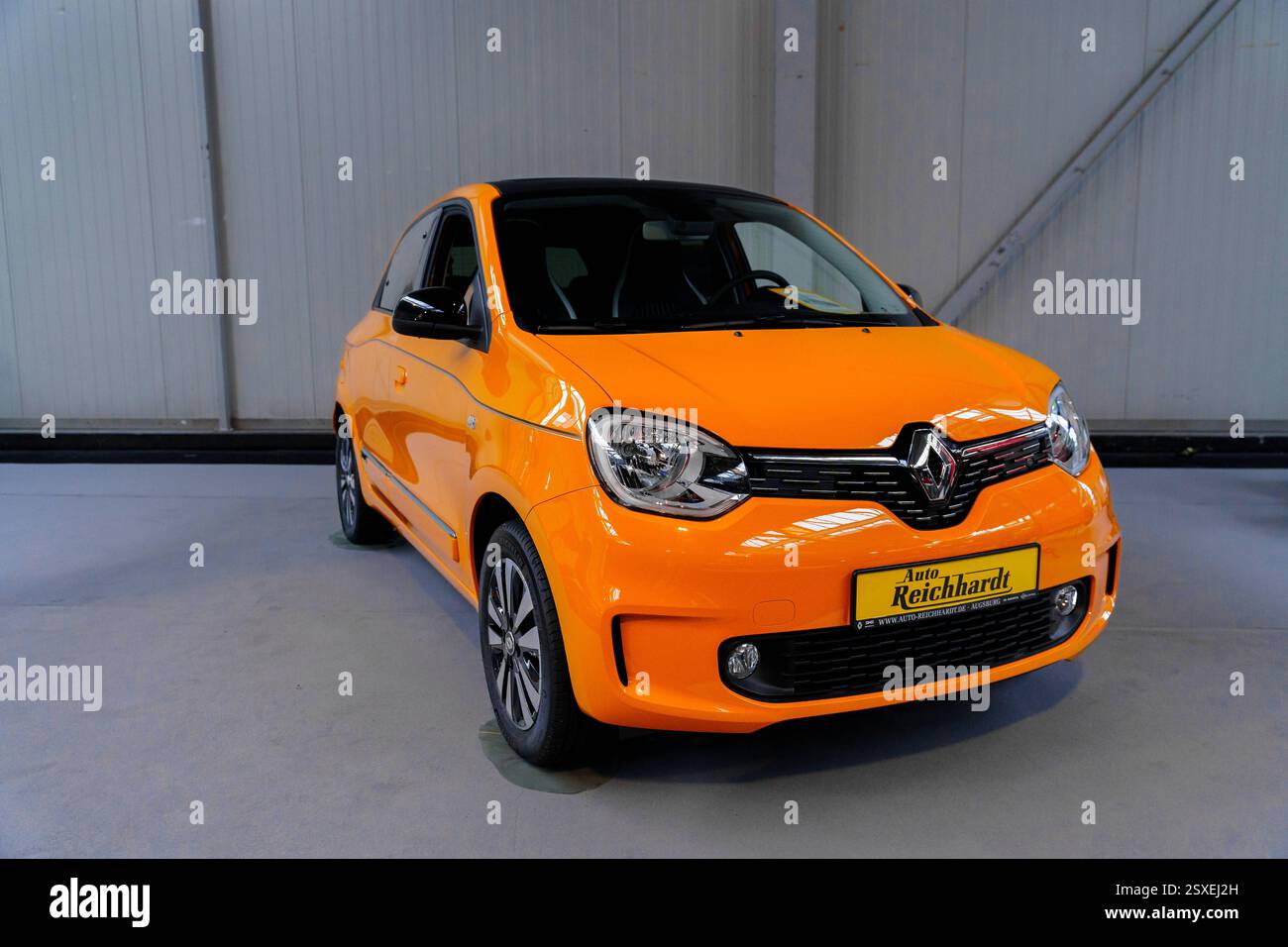 Augsburg, Bavaria, Germany - February 2, 2024: A bright orange Renault ...