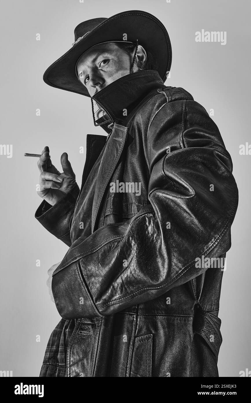 Cinematic portrait of brutal man, cowboy standing in leather coat and ...