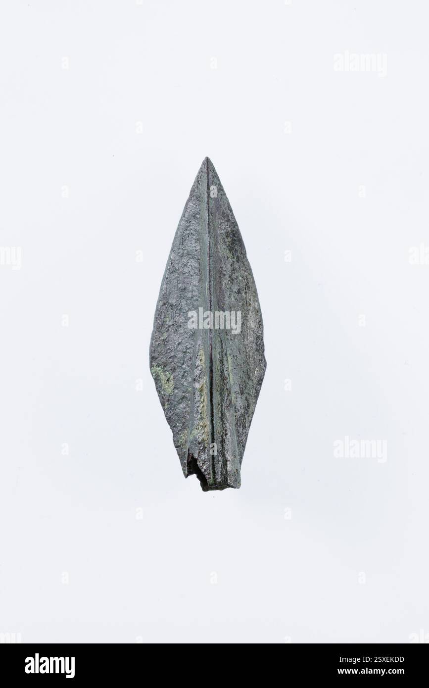 This arrow point, made from bronze or copper alloy, dates back to the ...
