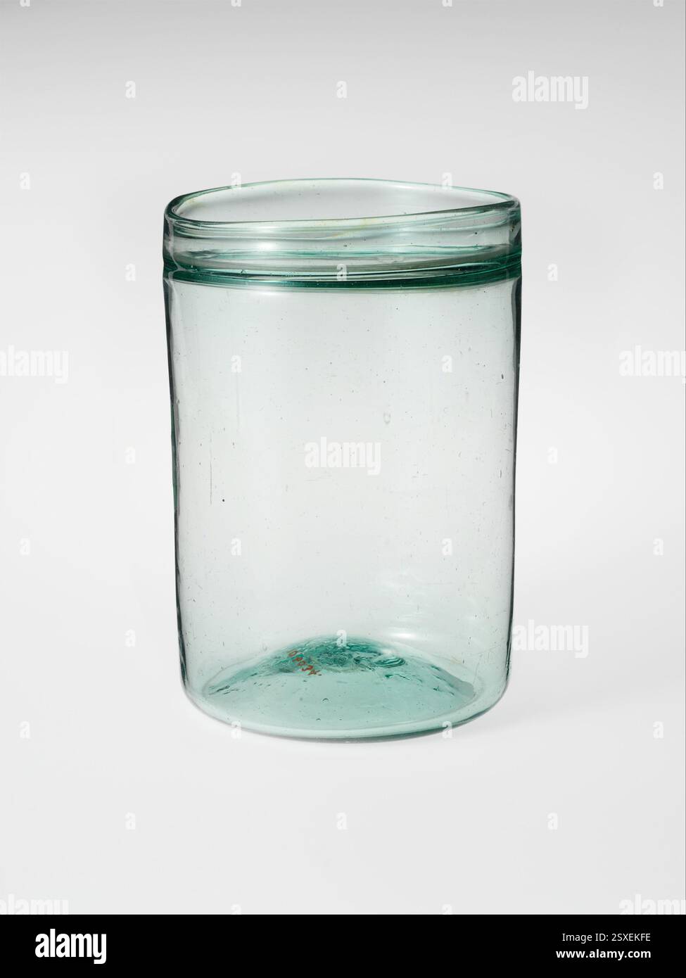 This 19th-century jar, likely used for storage or everyday purposes ...