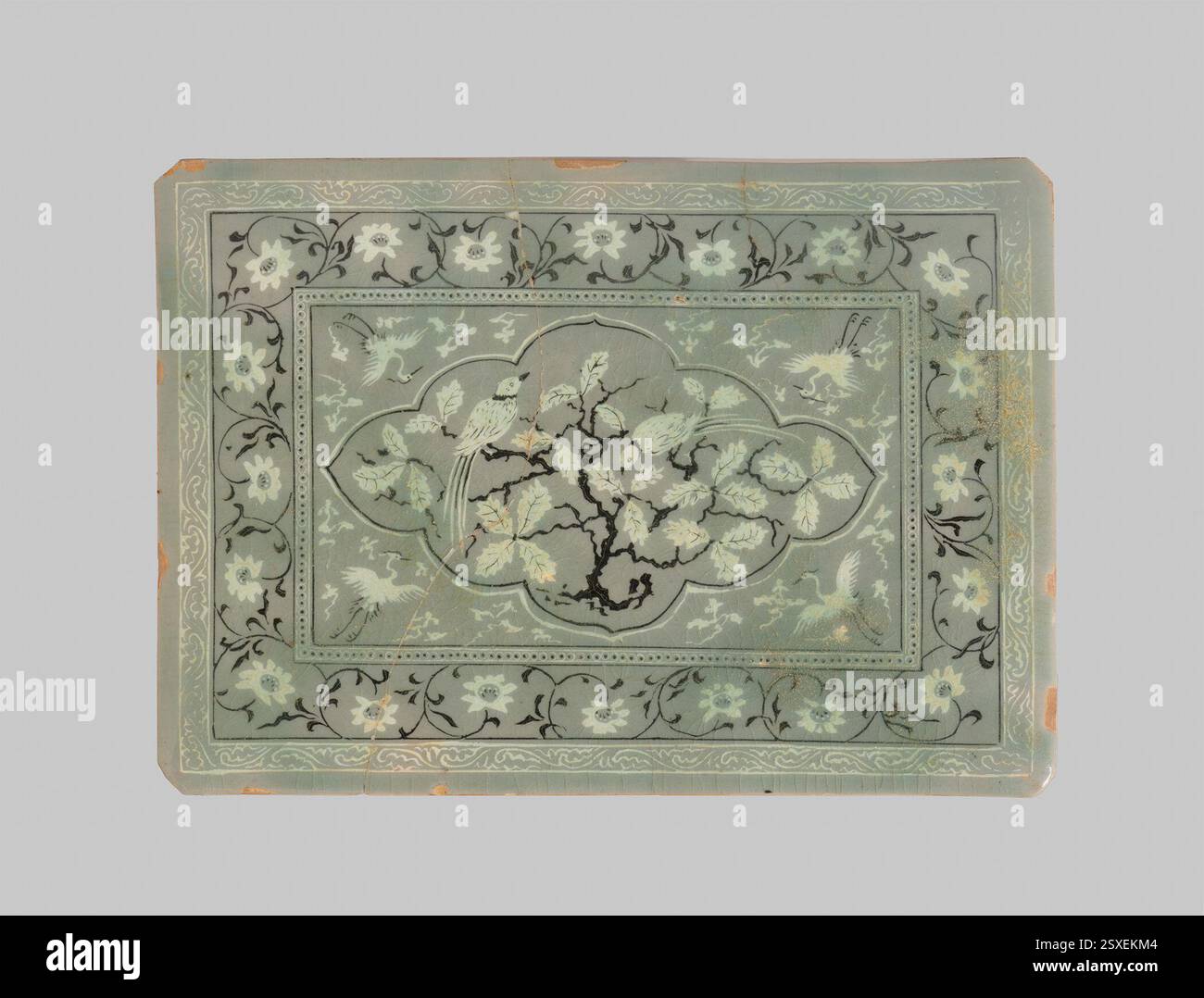 A 13th-century Korean celadon tile, decorated with birds and floral ...
